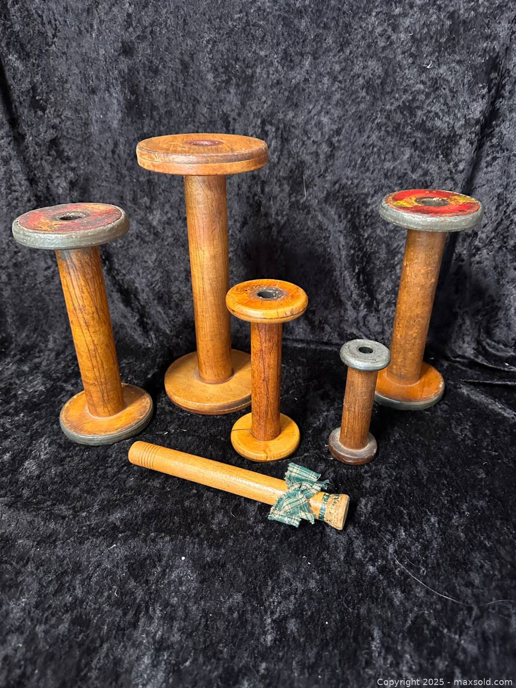 Six vintage wooden textile spools | Maxsold