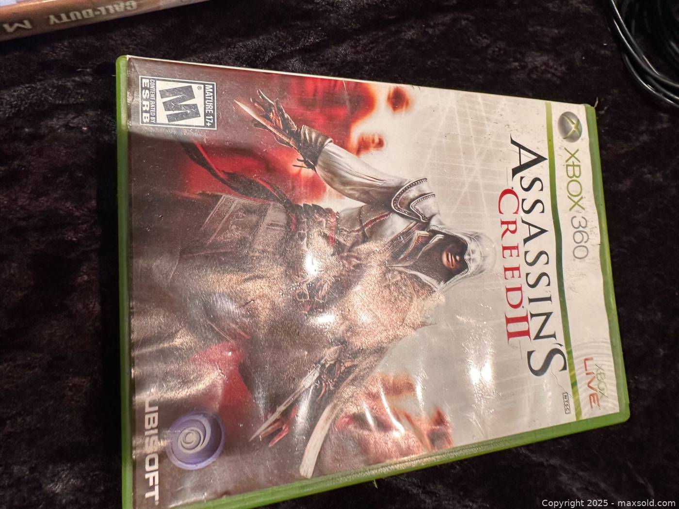Two PS2 Consoles, Controllers & 10 Xbox 360 Games | Maxsold