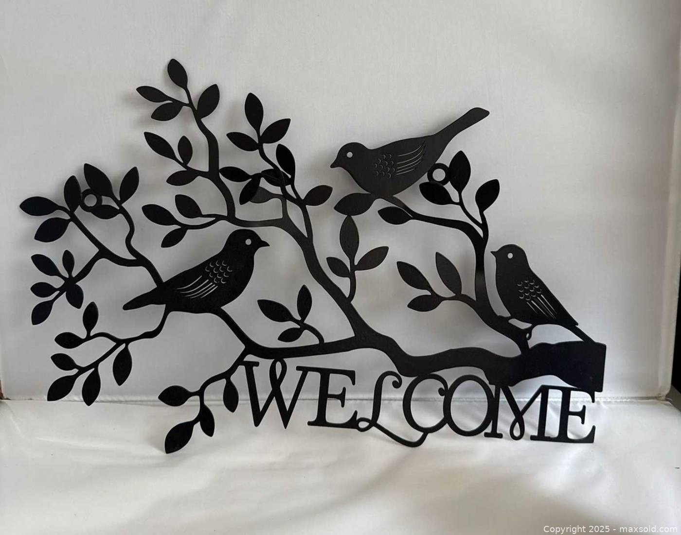 Decorative Figurines and Metal Welcome Sign | Maxsold