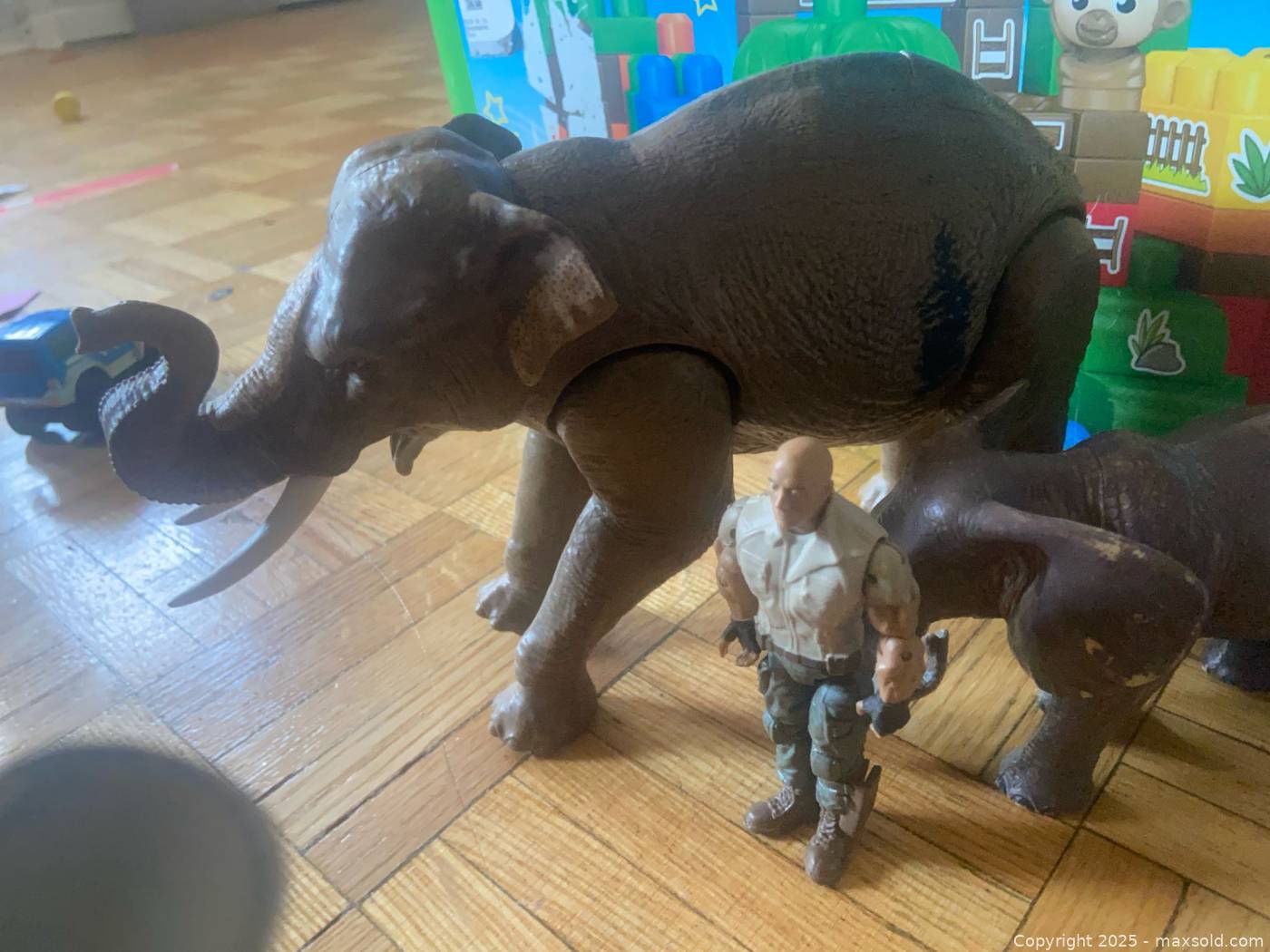 Plastic Elephant Figures With Action Figure | Maxsold