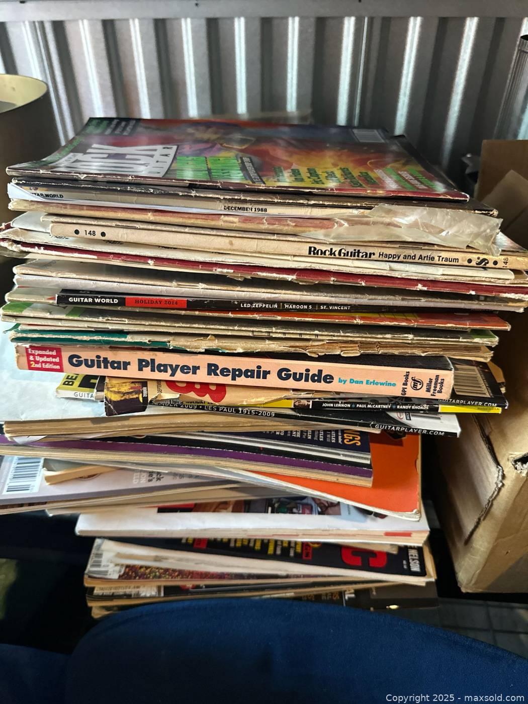 Music and guitar magazines with repair guide | Maxsold