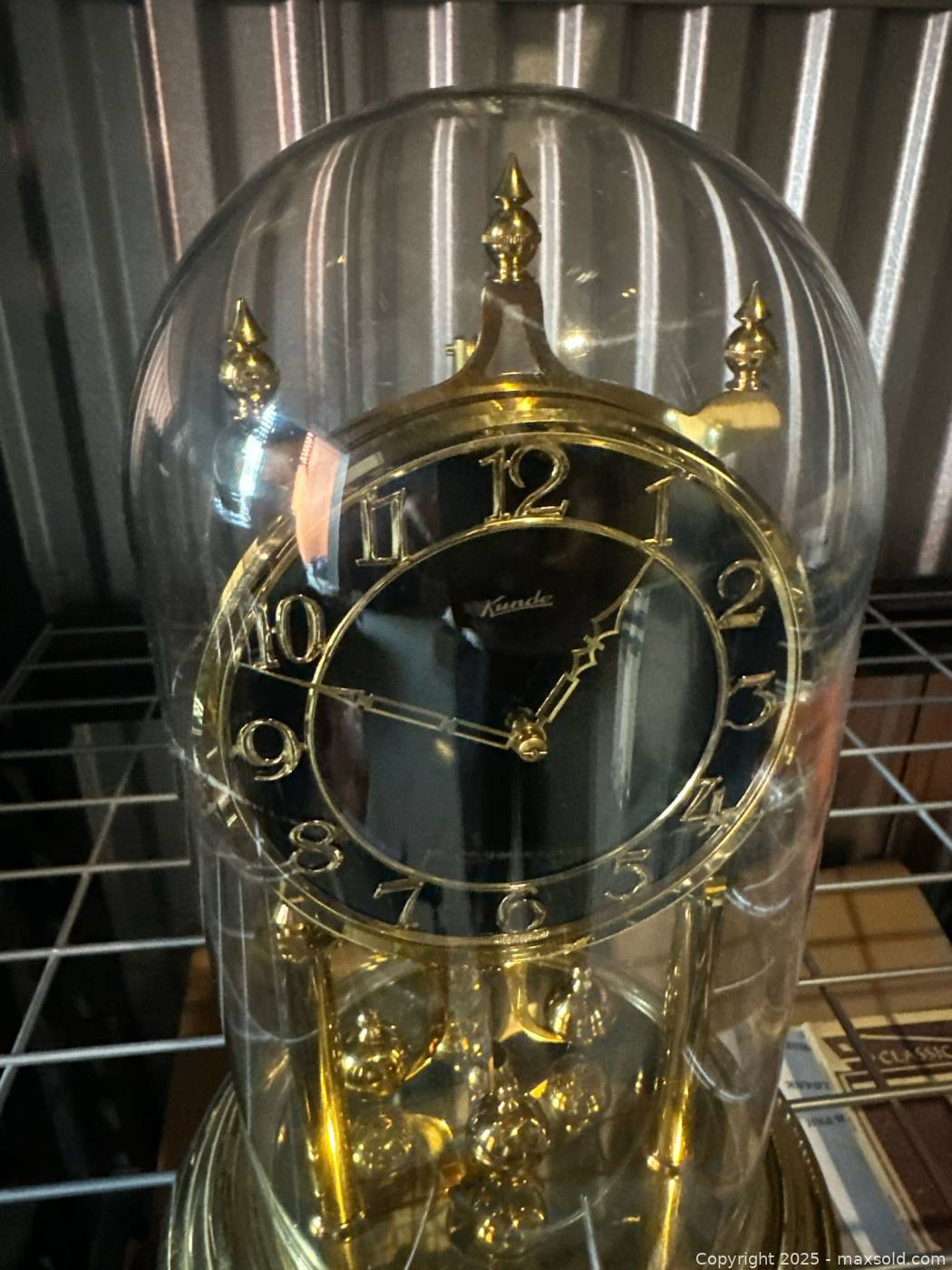 Seiko brass rotating anniversary clock | Maxsold