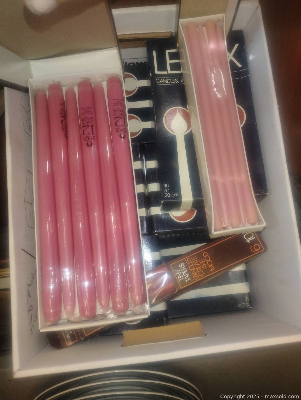 Assorted boxed taper candles Lenox and others | Maxsold