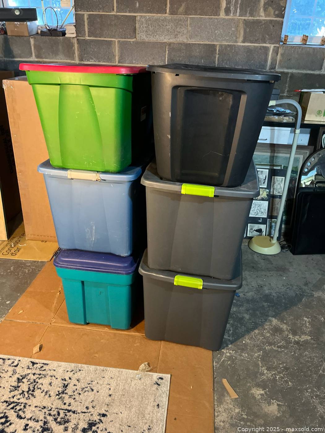 Six large plastic storage bins | Maxsold