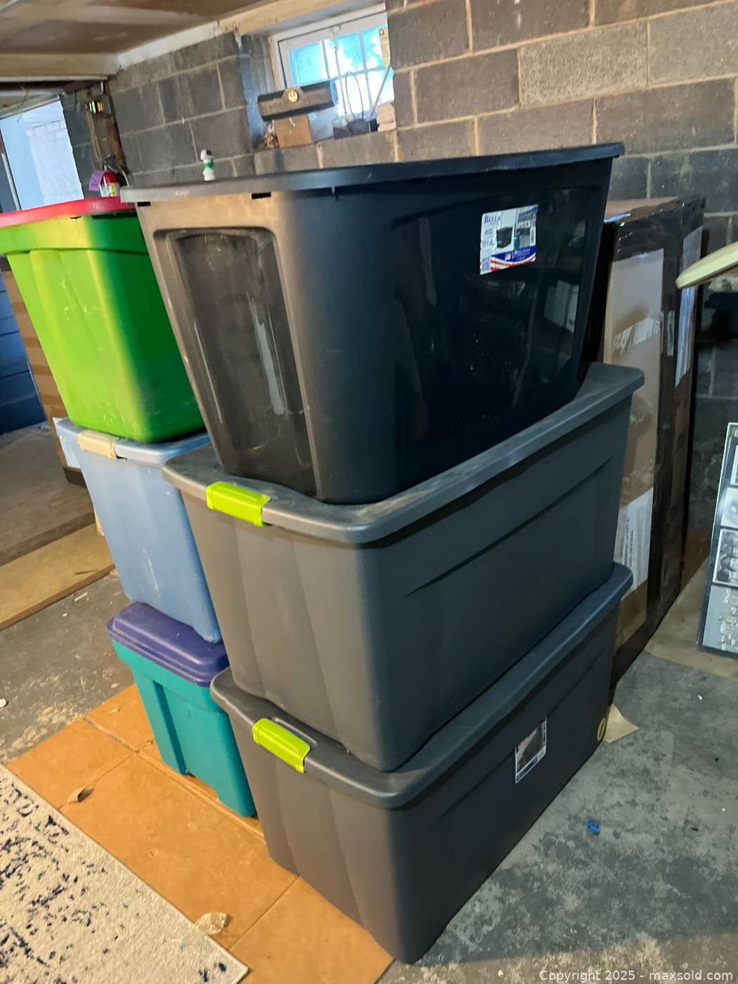 Six large plastic storage bins | Maxsold