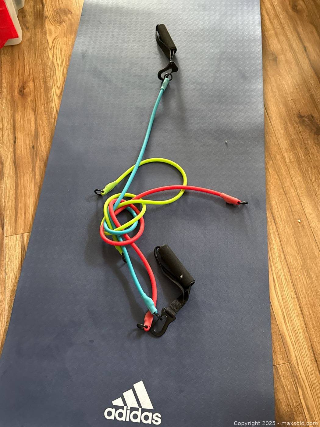 Adidas yoga mat with three resistance tubes and two handles | Maxsold