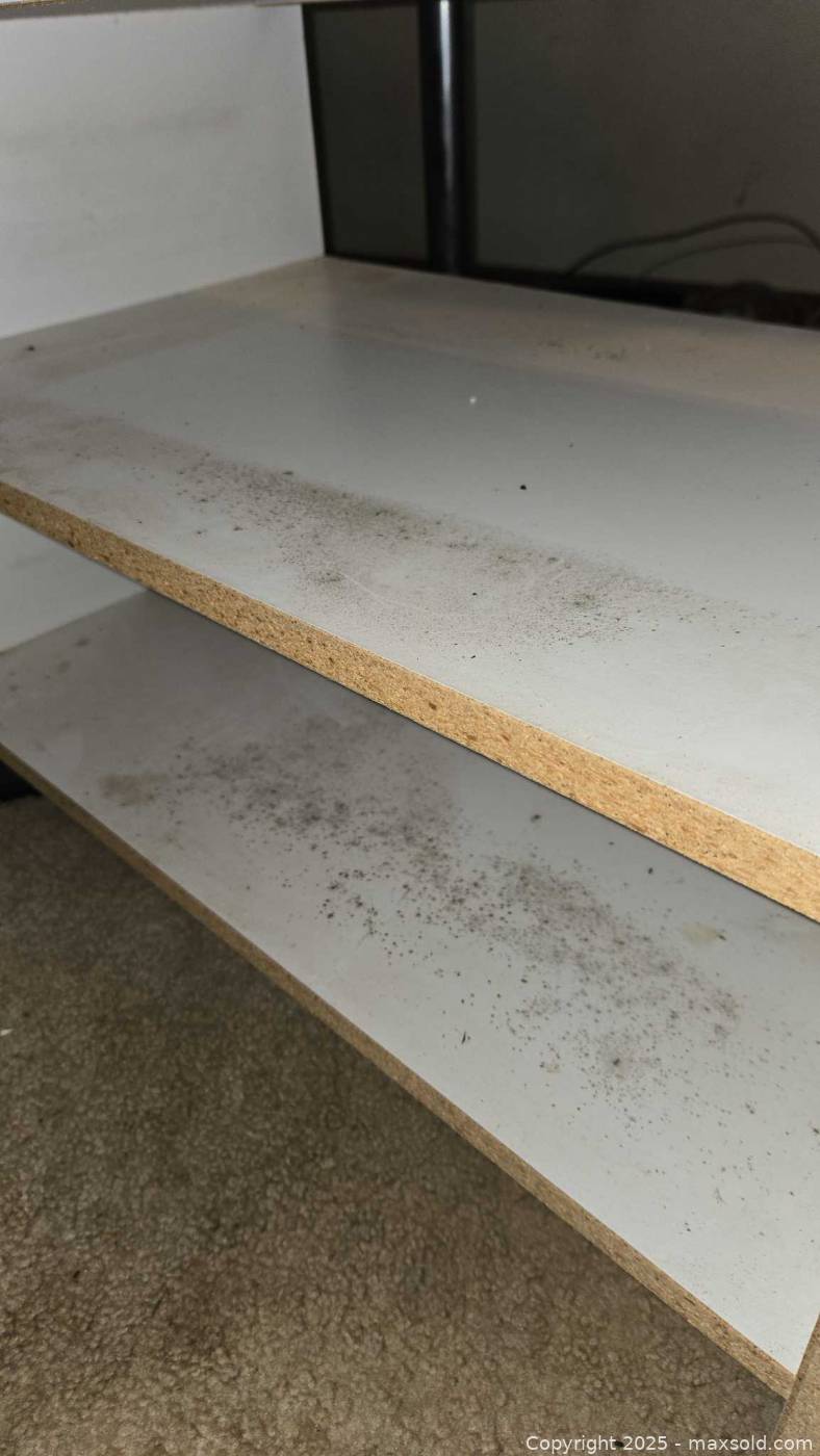 Rolling white laminate utility cart on casters | Maxsold