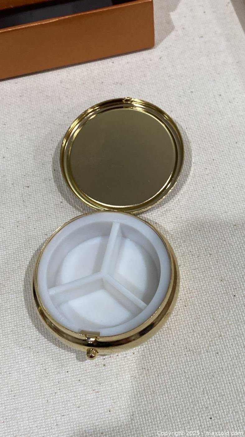 Three watches, metal bracelet, enamel butterfly pin, round pill box ...