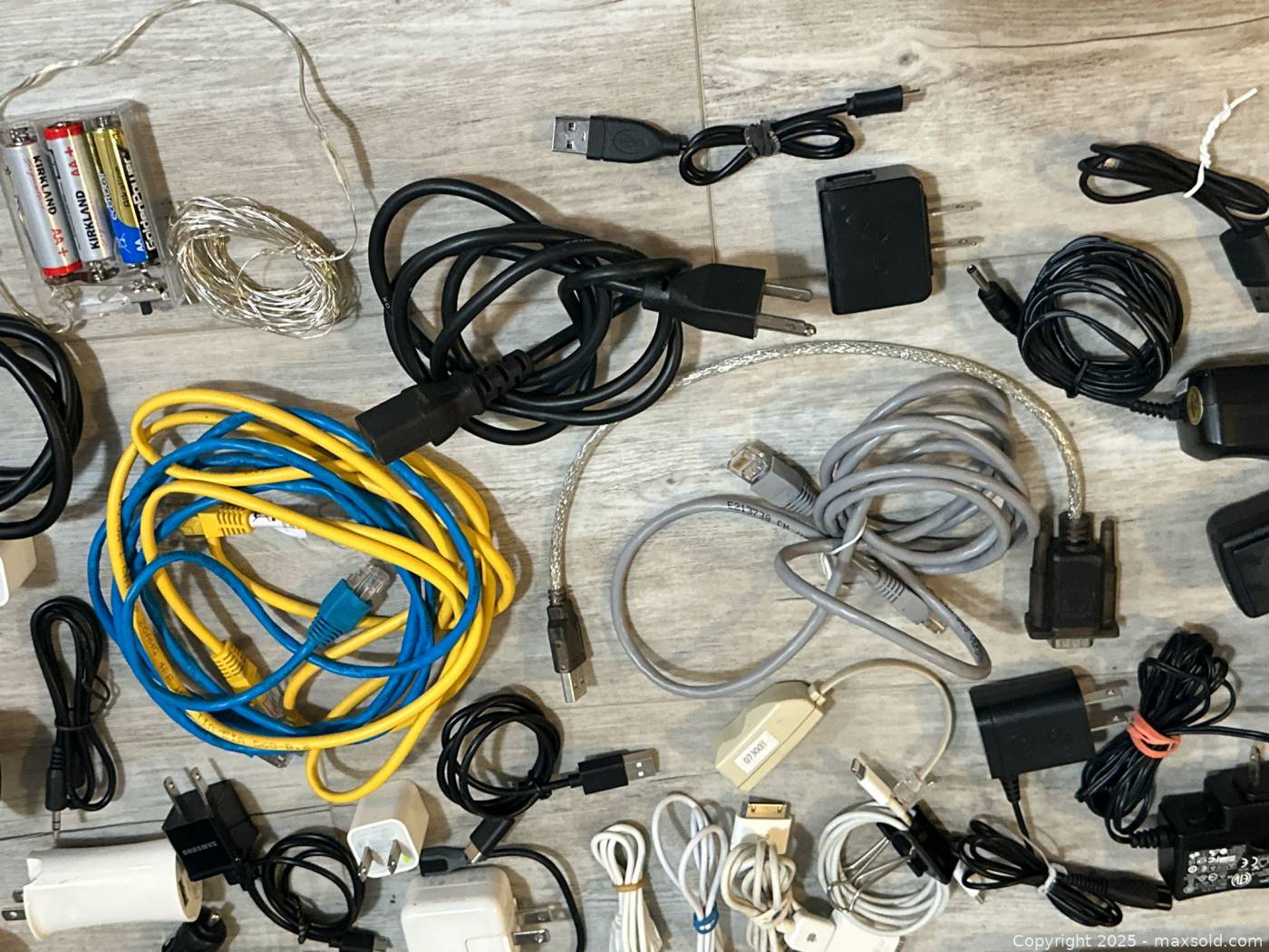 Assorted charging cables, adapters, cords | Maxsold