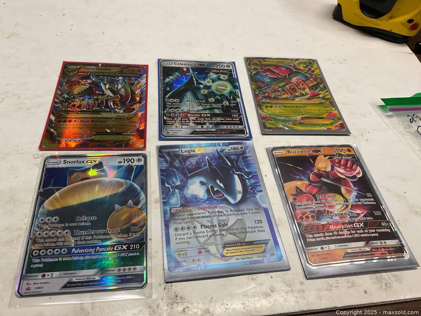 6 holographic Pokémon GX⁄EX cards | Maxsold