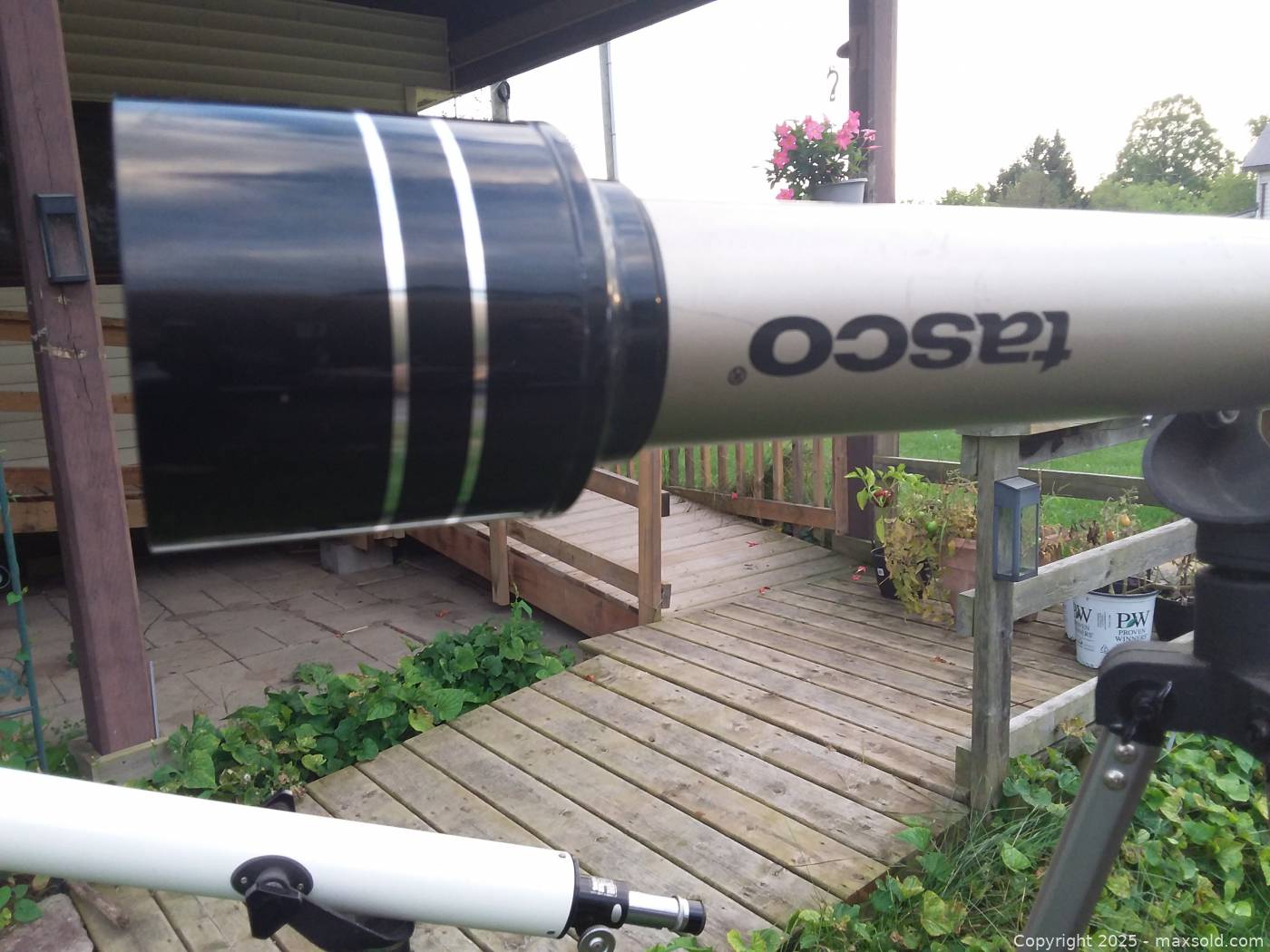 Two Tasco refractor telescopes on tripods | Maxsold