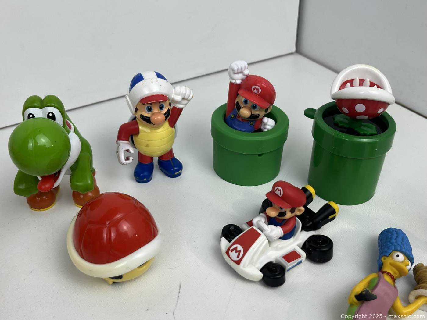 Minions, Super Mario & Simpsons figurines | Maxsold