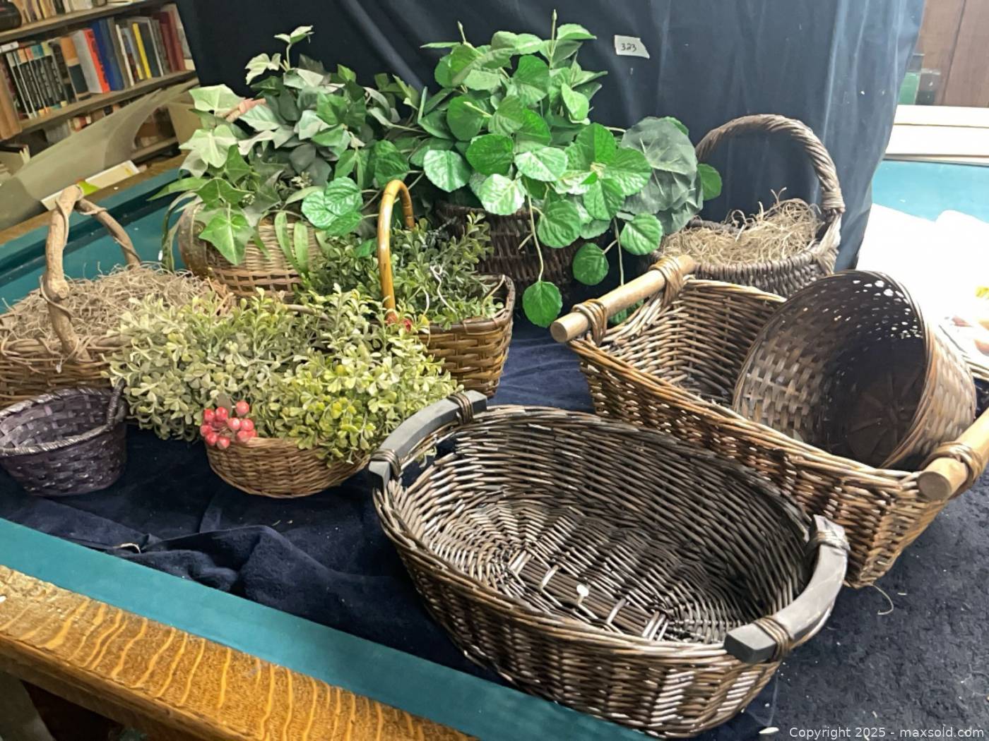 Assorted wicker baskets and faux greenery, approx 10 pcs | Maxsold