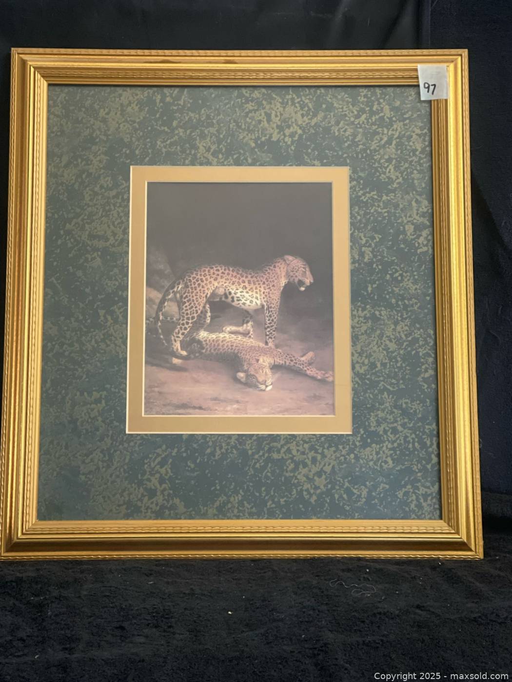 Framed cheetah print under glass | Maxsold