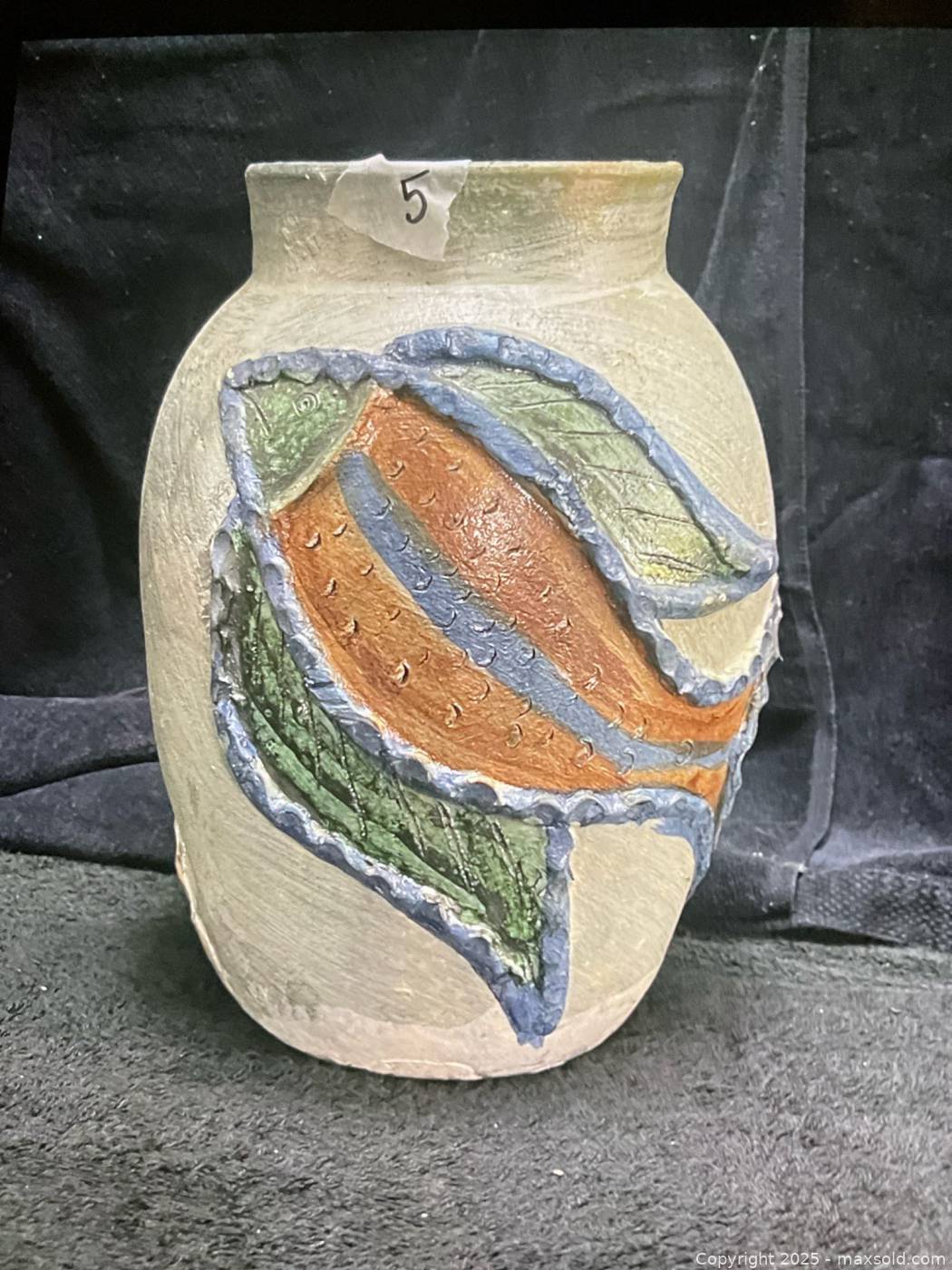 Handmade ceramic vase with raised fish motif | Maxsold