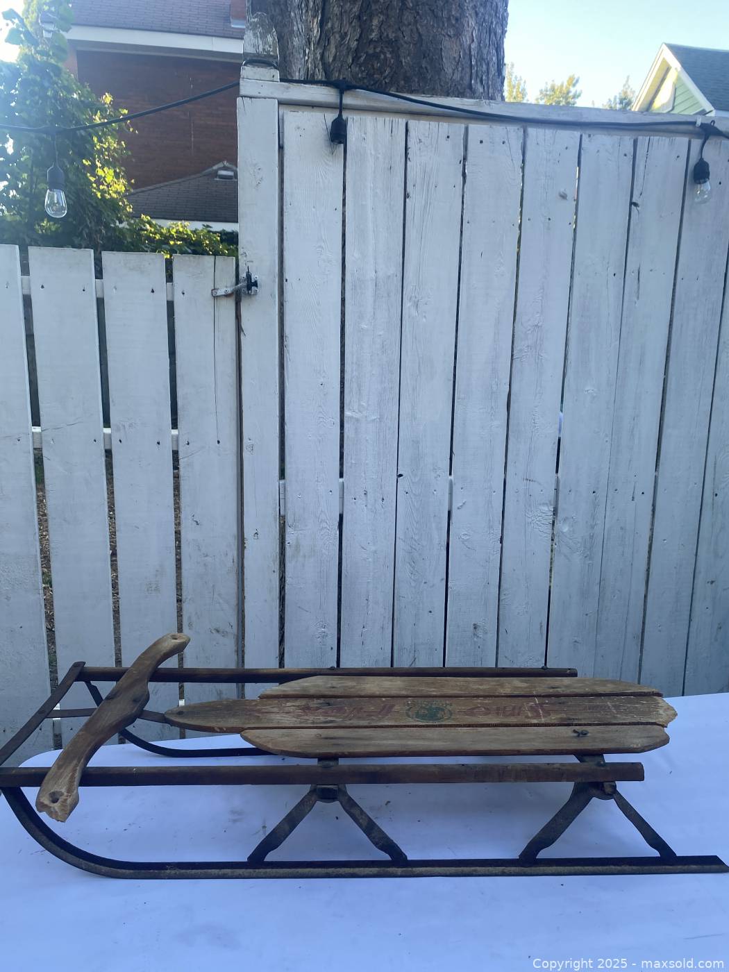 Vintage Monarch wooden and metal sled | Maxsold