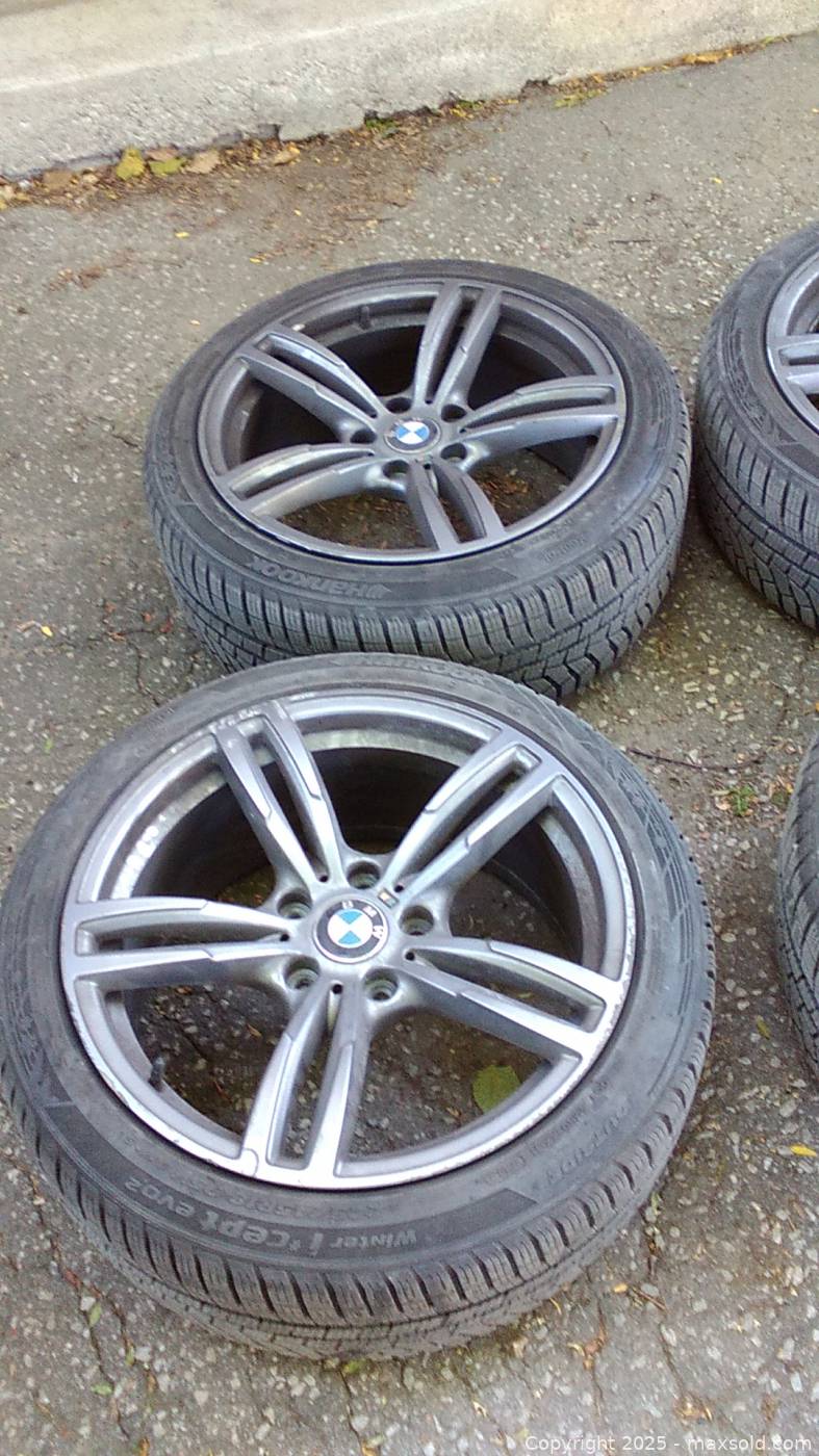 Set of 4 BMW 18" alloy rims with 225/45R18 Hankook winter tires | Maxsold