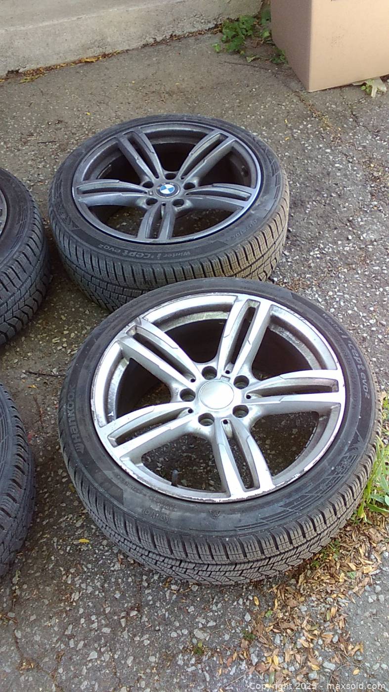 Set of 4 BMW 18" alloy rims with 225/45R18 Hankook winter tires | Maxsold