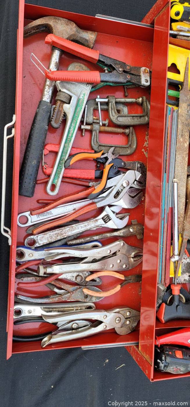 Red steel toolbox with assorted hand tools | Maxsold