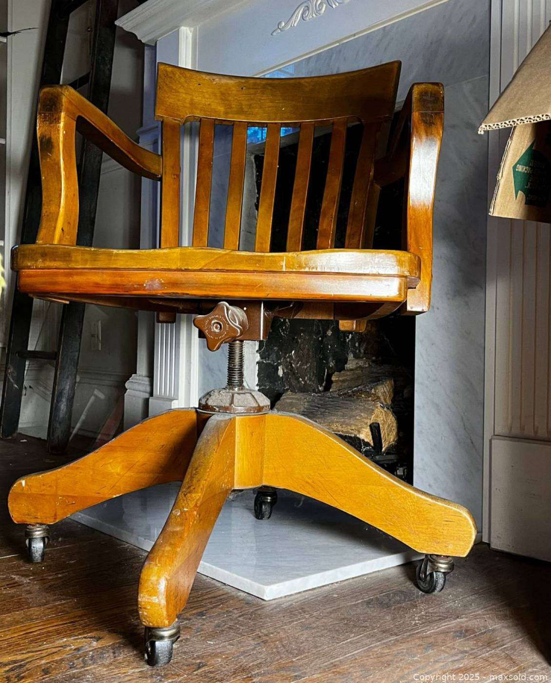 Vintage maple swivel rolling office chair | Maxsold