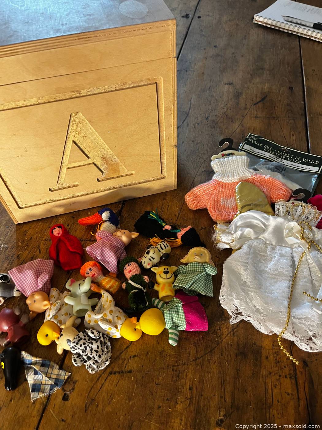 Wooden alphabet-number box, finger puppets, doll outfits | Maxsold