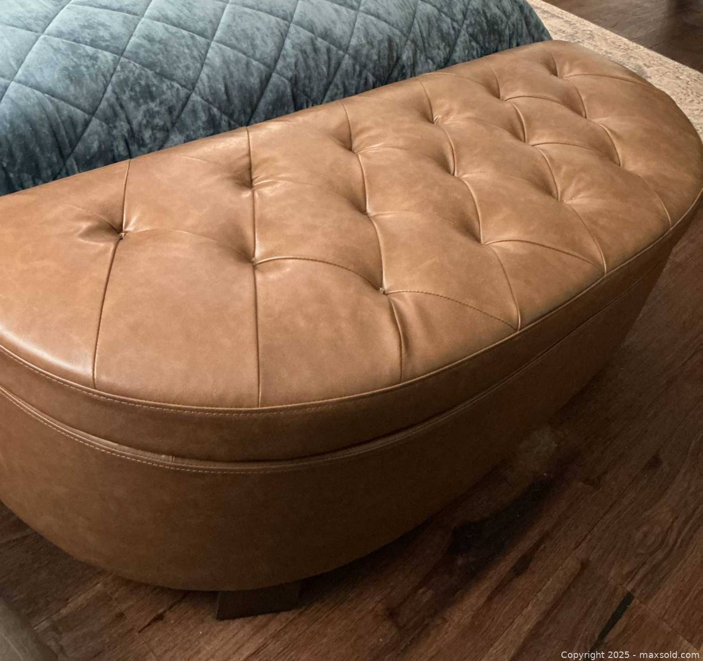 Caramel vinyl upholstered storage bench | Maxsold