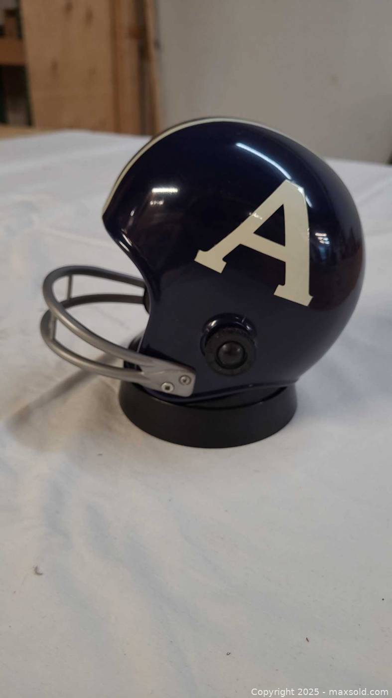 22 Toronto Argonauts helmet AM radios | Maxsold
