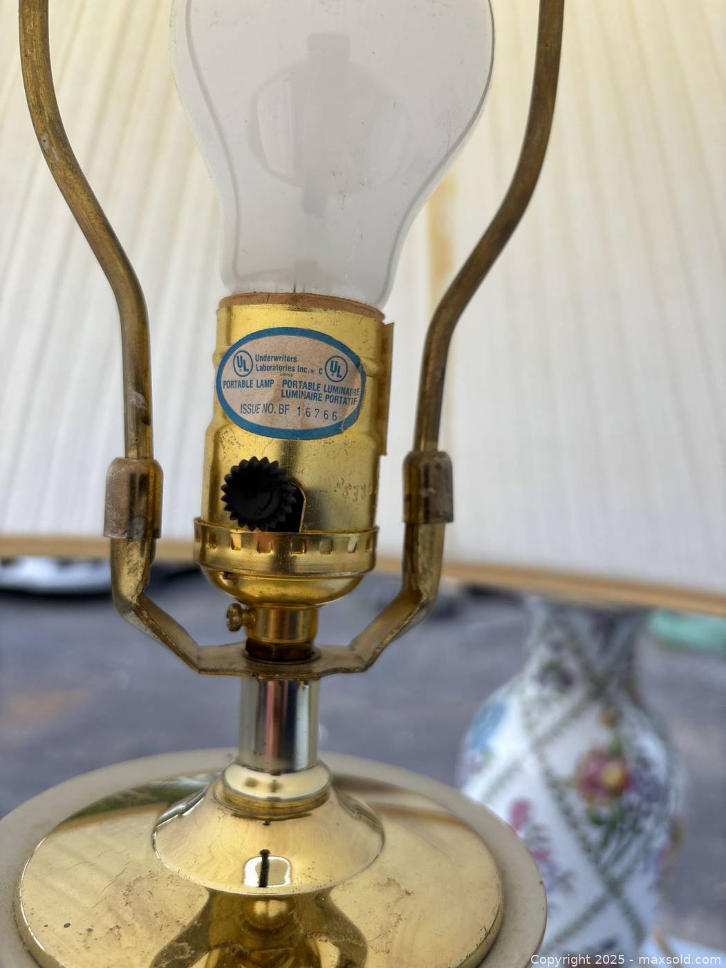 Pair of 26" brass-tone table lamps with shades | Maxsold