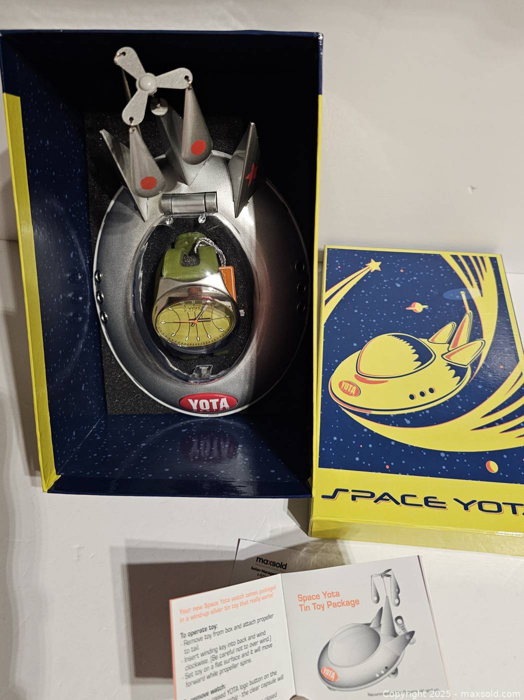Space Yota watch with spaceship tin display | Maxsold