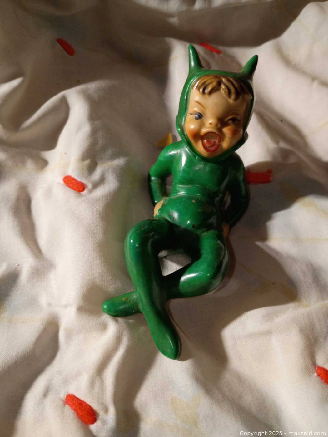Vintage green devil elf figurine | Maxsold