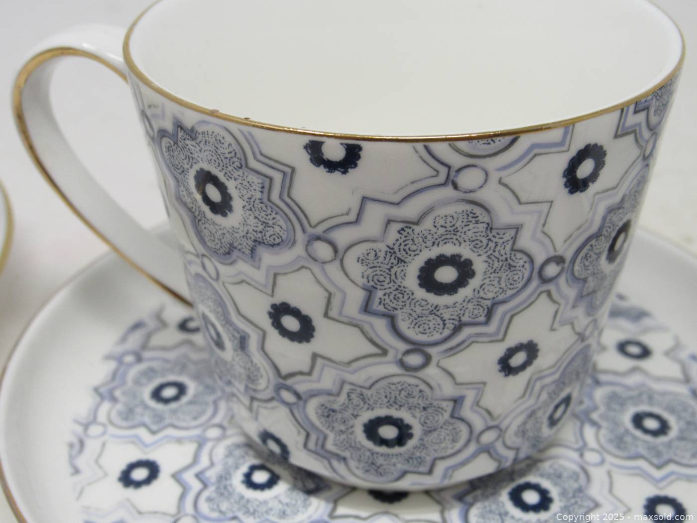 Four teacup and saucer sets | Maxsold