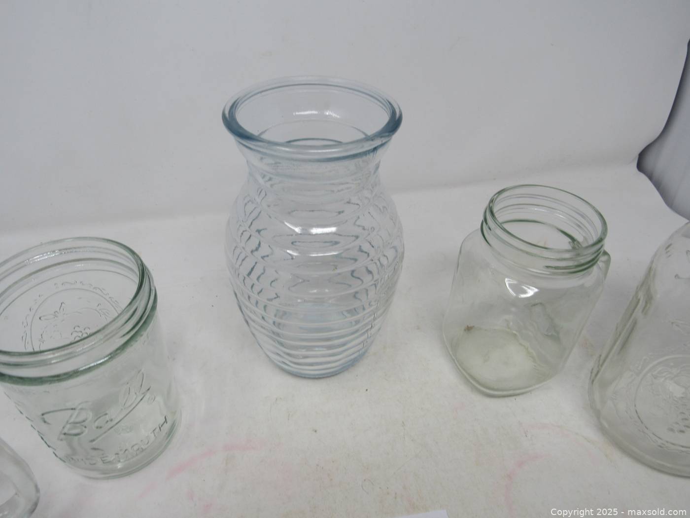 Glass vase, mason jar mugs and canning jars | Maxsold