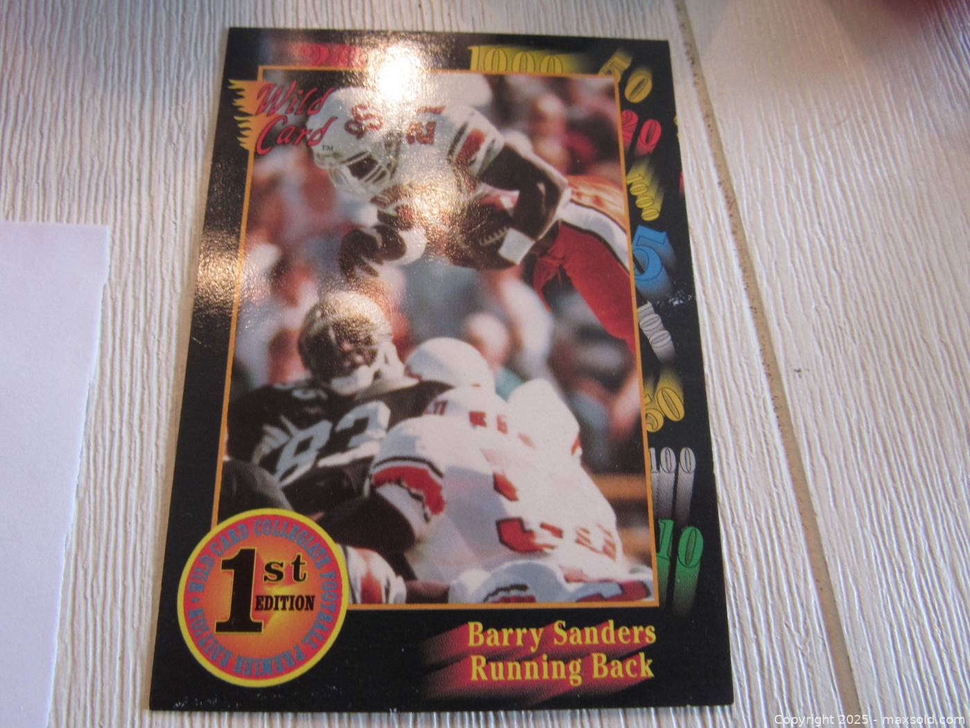NFL miniature mugs and Barry Sanders card | Maxsold