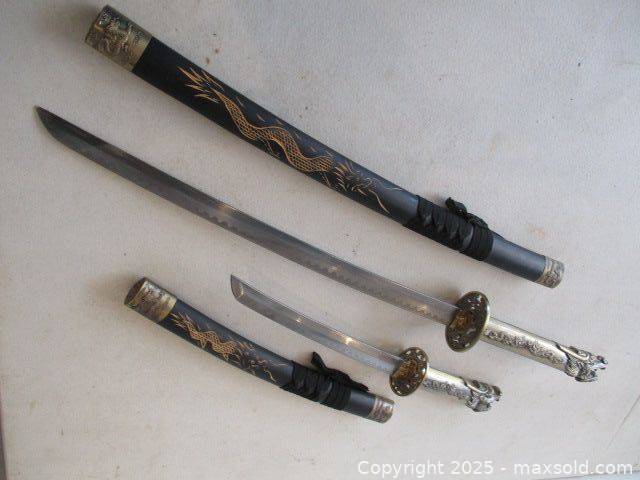 Two ornate dragon-hilt samurai swords | Maxsold