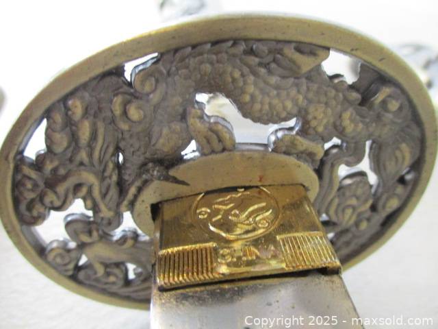 Two ornate dragon-hilt samurai swords | Maxsold