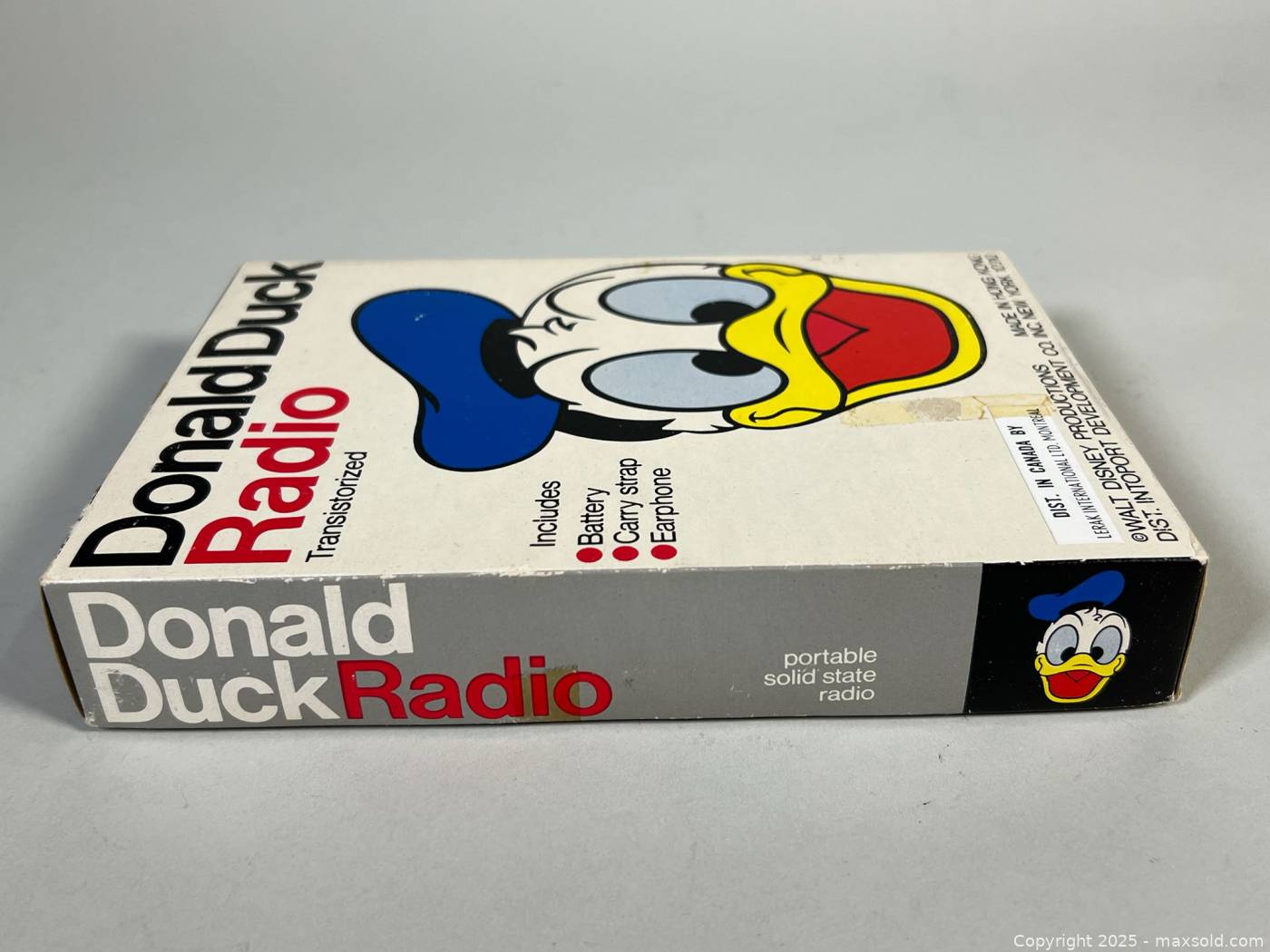 Donald Duck portable transistor radio sealed in original box | Maxsold