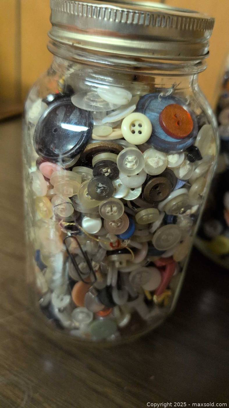 Two jars of assorted buttons | Maxsold