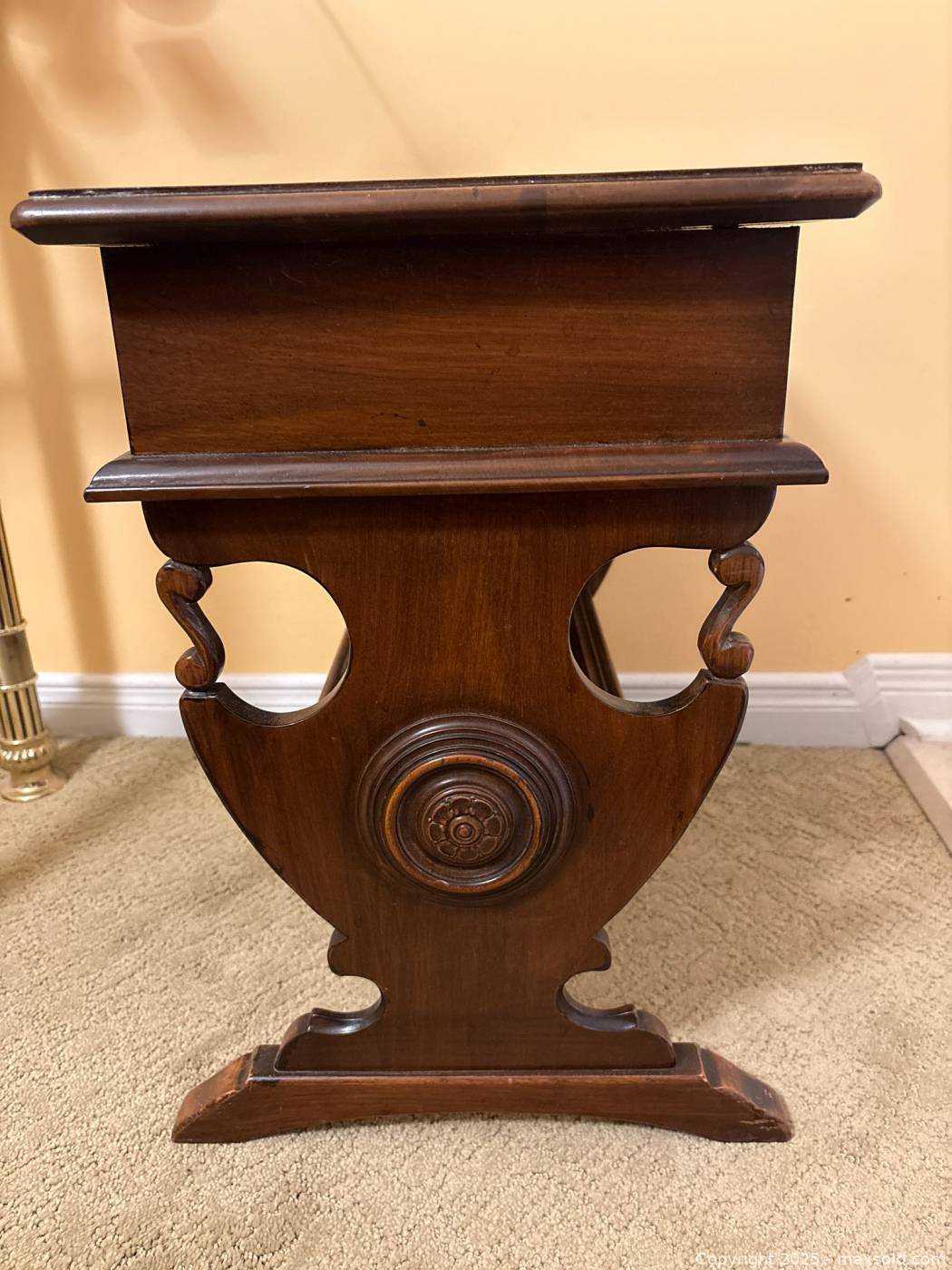 Carved wooden side table with shelf and magazine rack | Maxsold