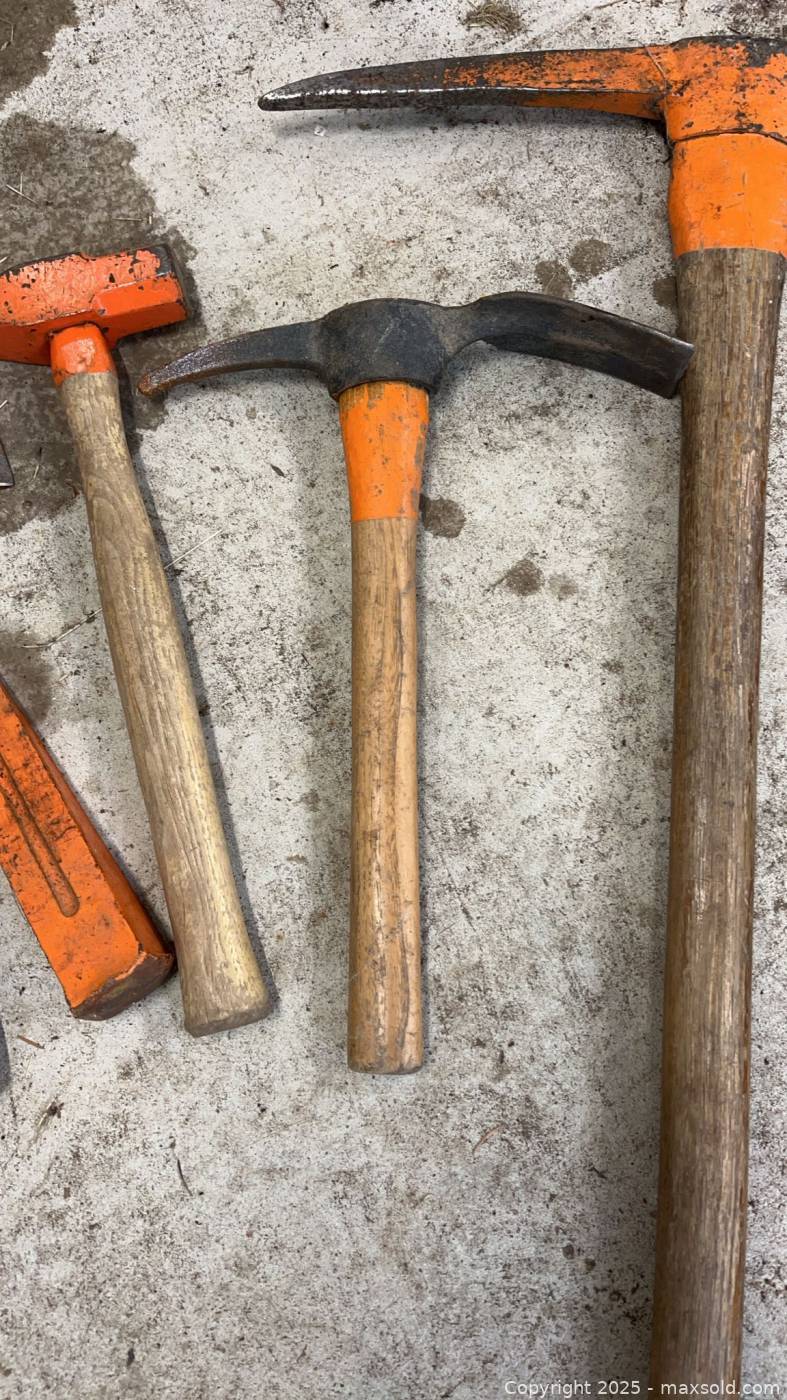 Axes, pickaxes, hammer and wedge | Maxsold