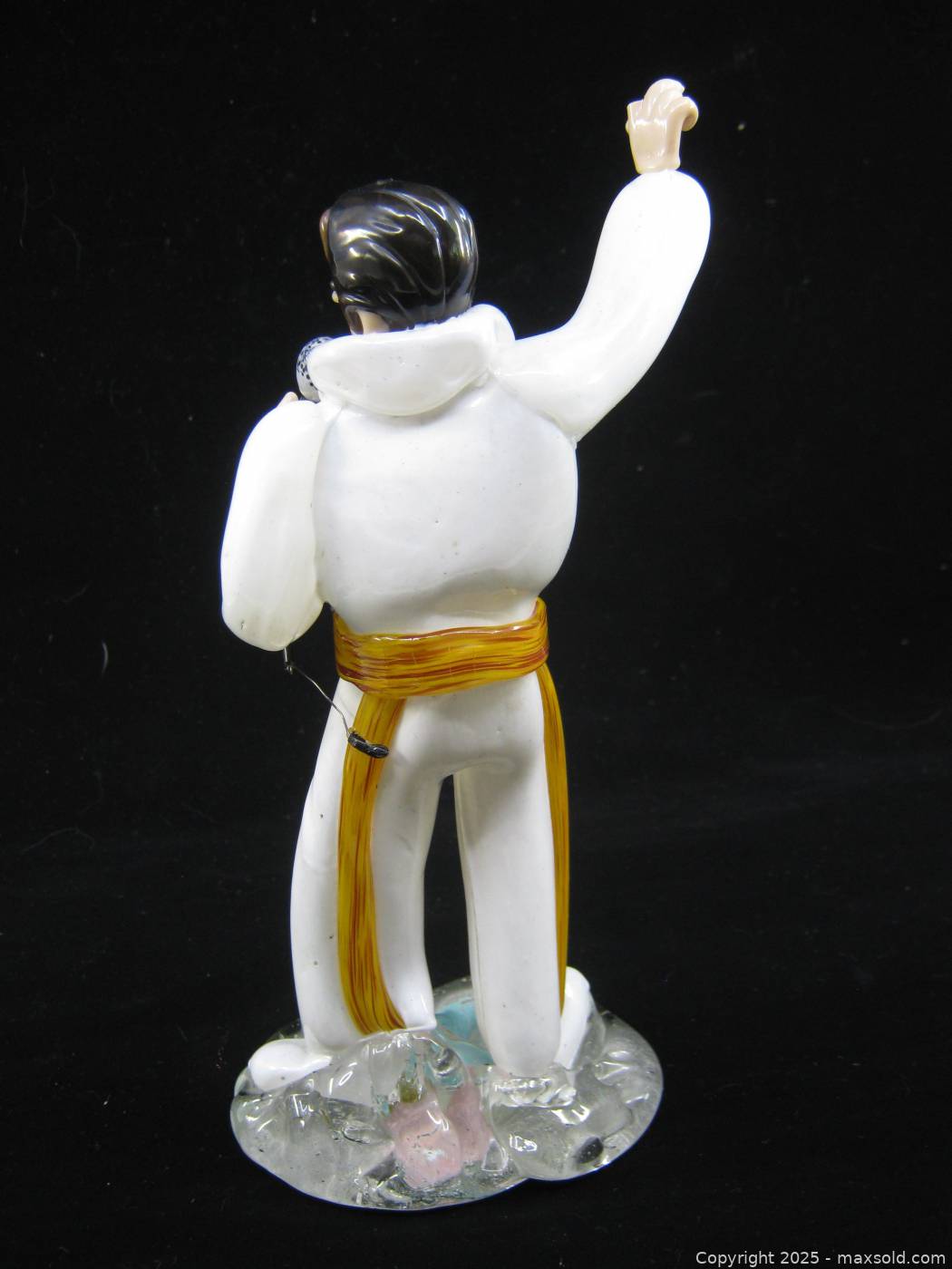 Handblown Elvis Presley glass figurine | Maxsold