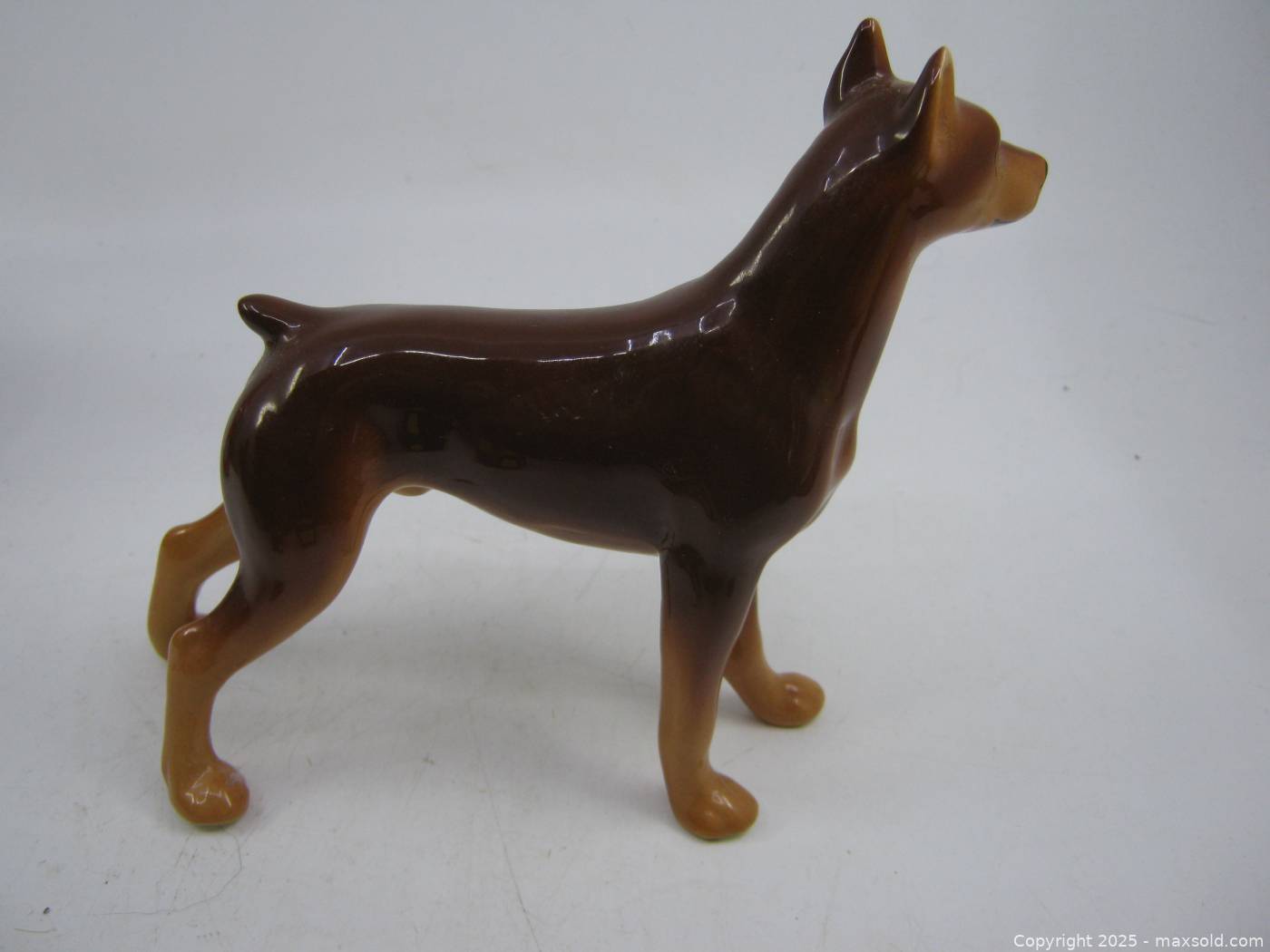 Pridmore ceramic dog figurine | Maxsold