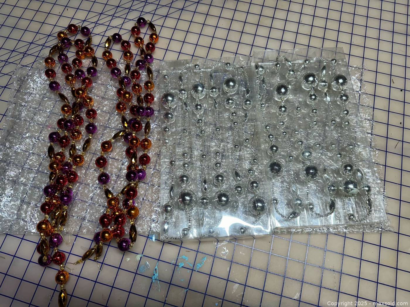 Beaded garlands and silver bead strips | Maxsold