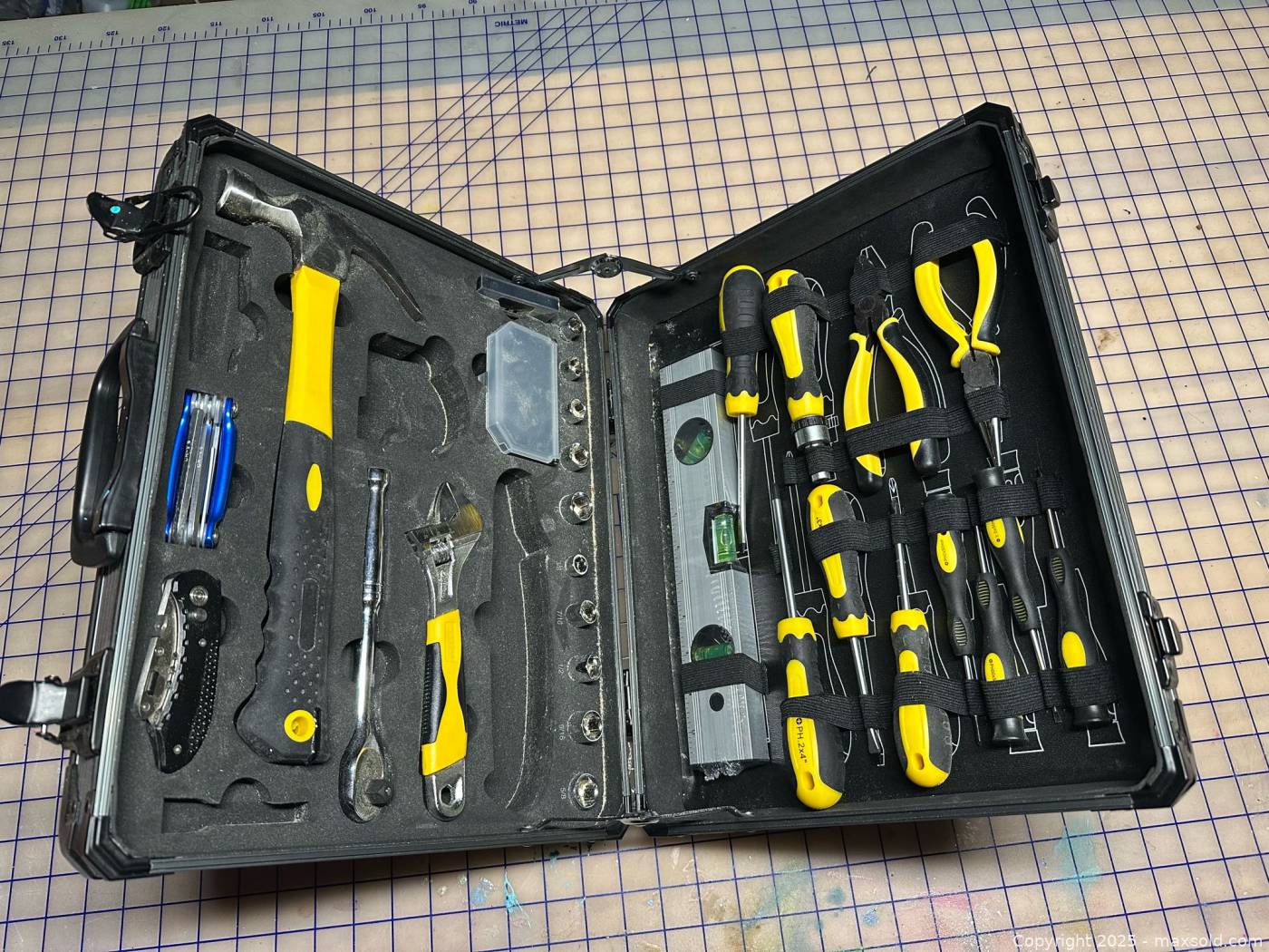 Yellow and black hand tool kit in hard case | Maxsold