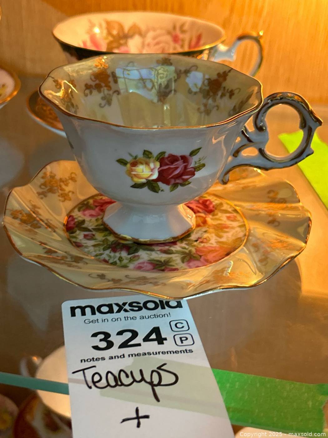 Assorted bone china teacups, saucers, silverplate scoops | Maxsold