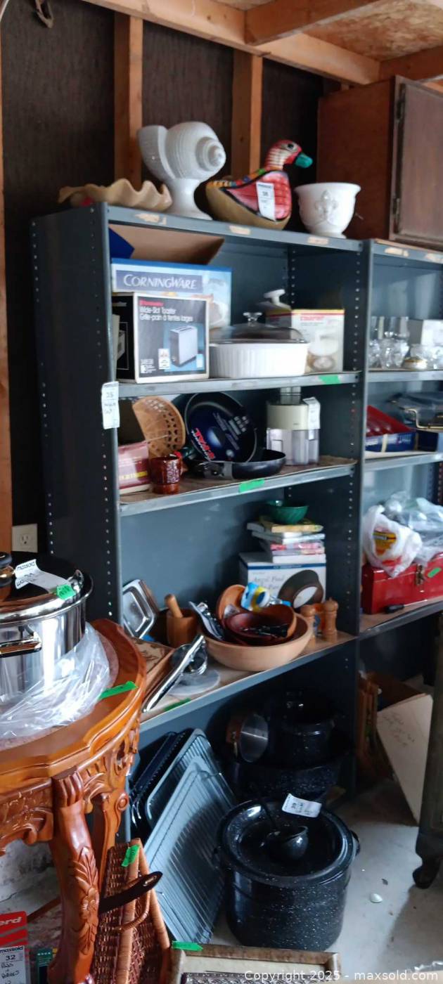 Freestanding adjustable gray metal 4-shelf storage unit | Maxsold