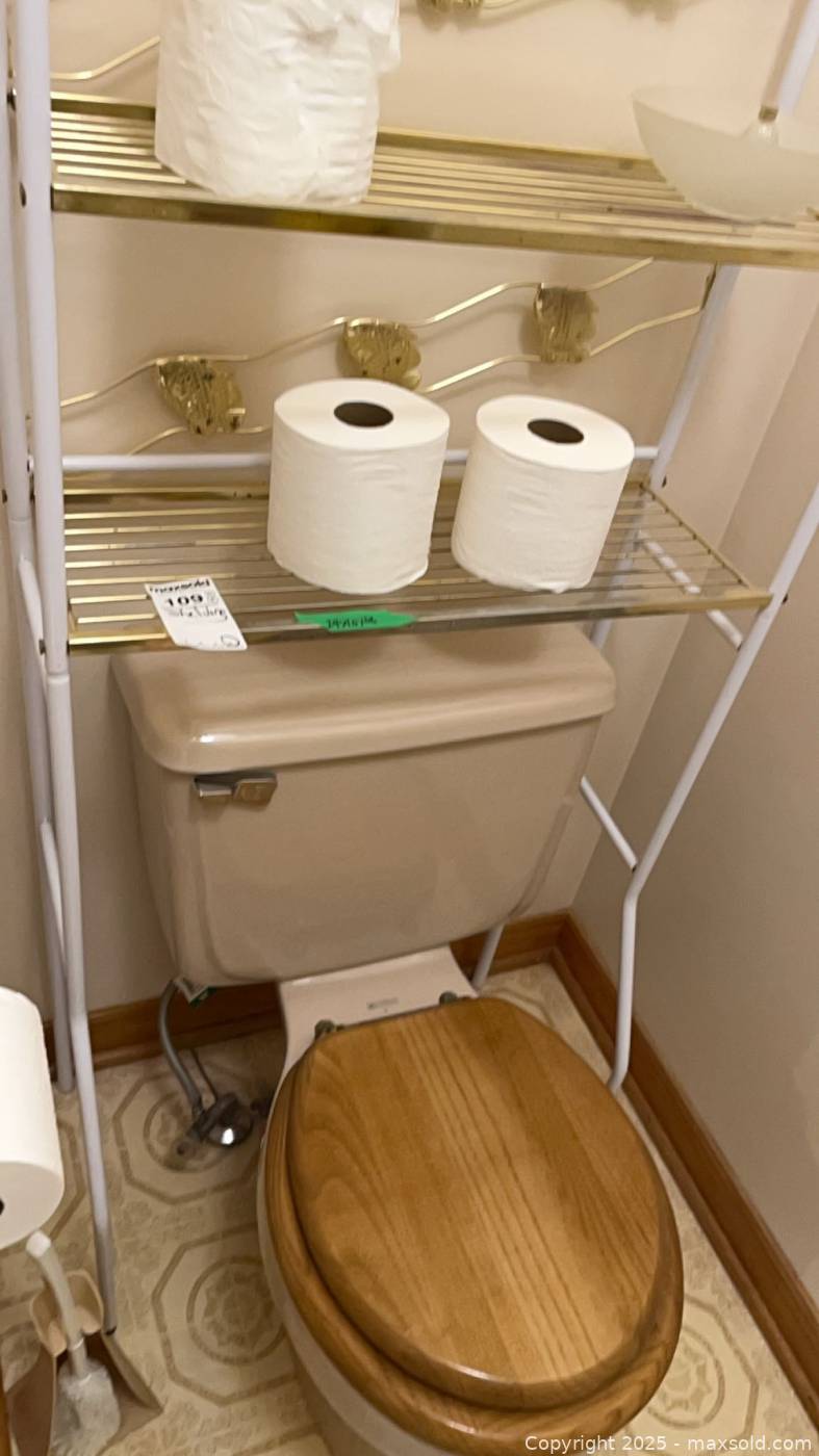 Over-the-toilet metal shelving unit 24x10x66 in | Maxsold