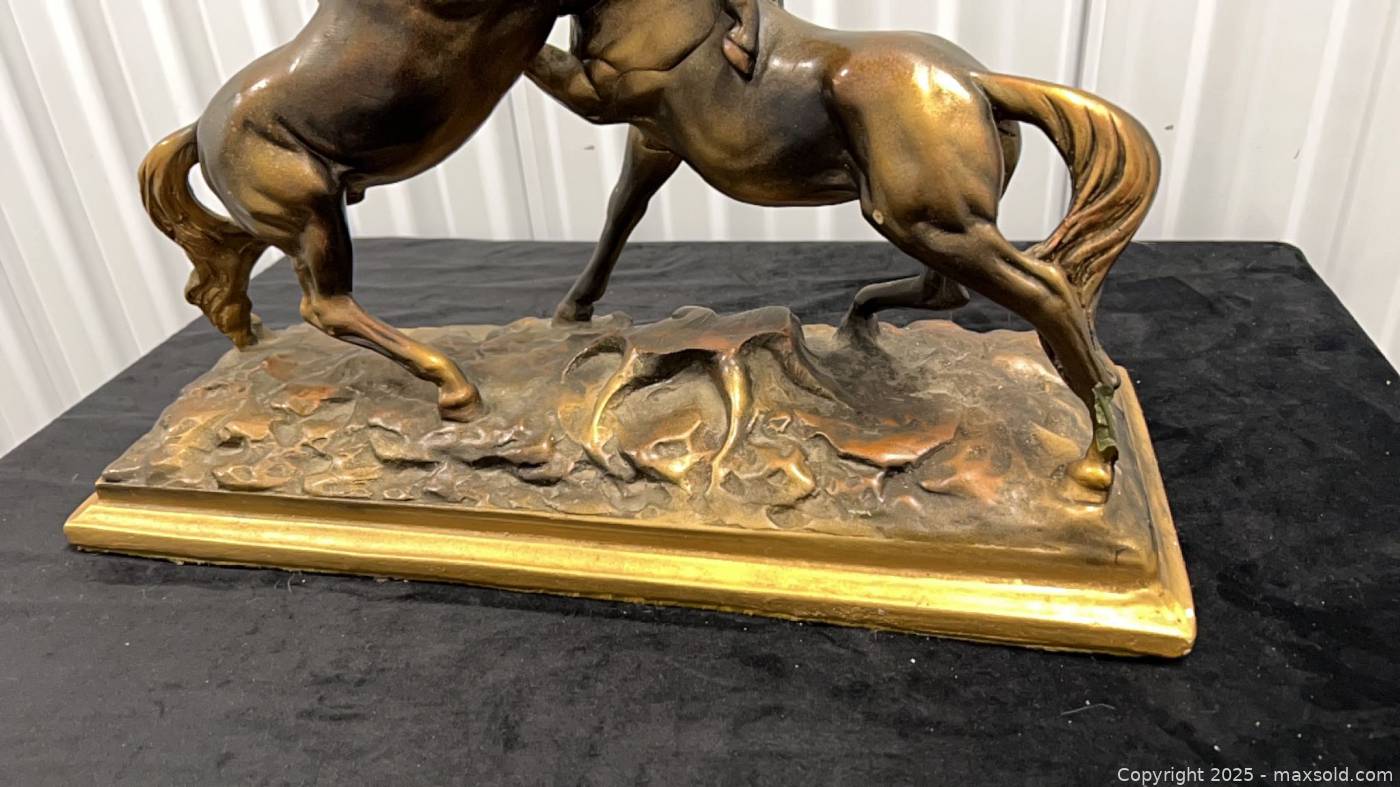 Fighting stallions ceramic statue | Maxsold