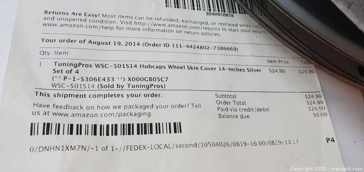 Three silver 14-inch plastic hubcaps | Maxsold