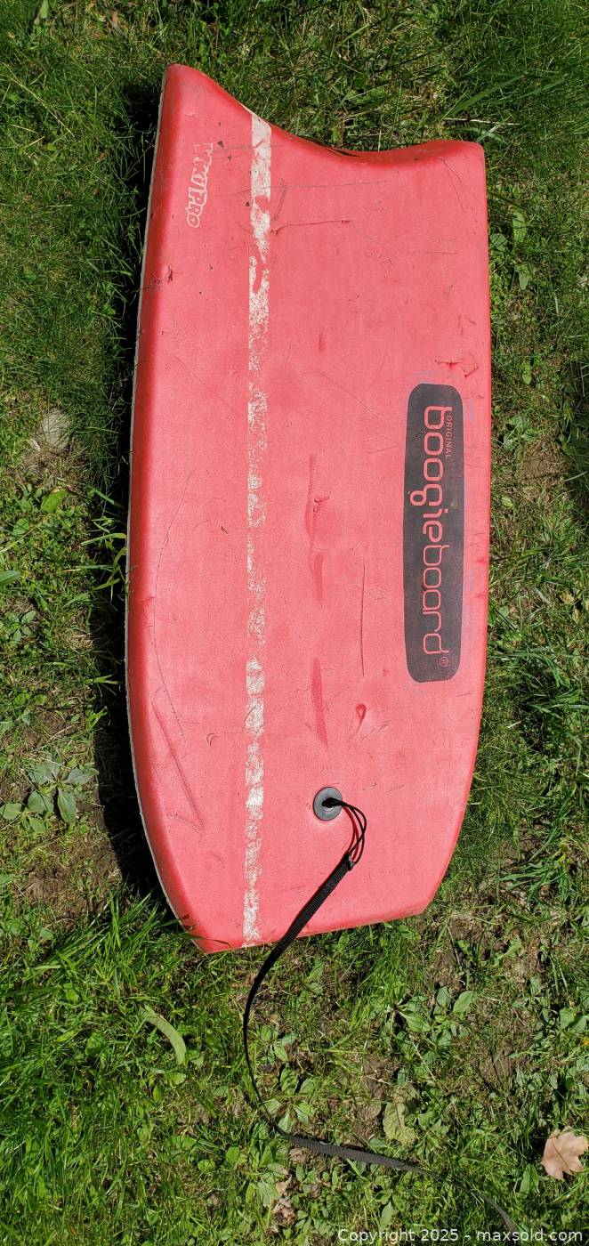 Purple and red boogie board | Maxsold
