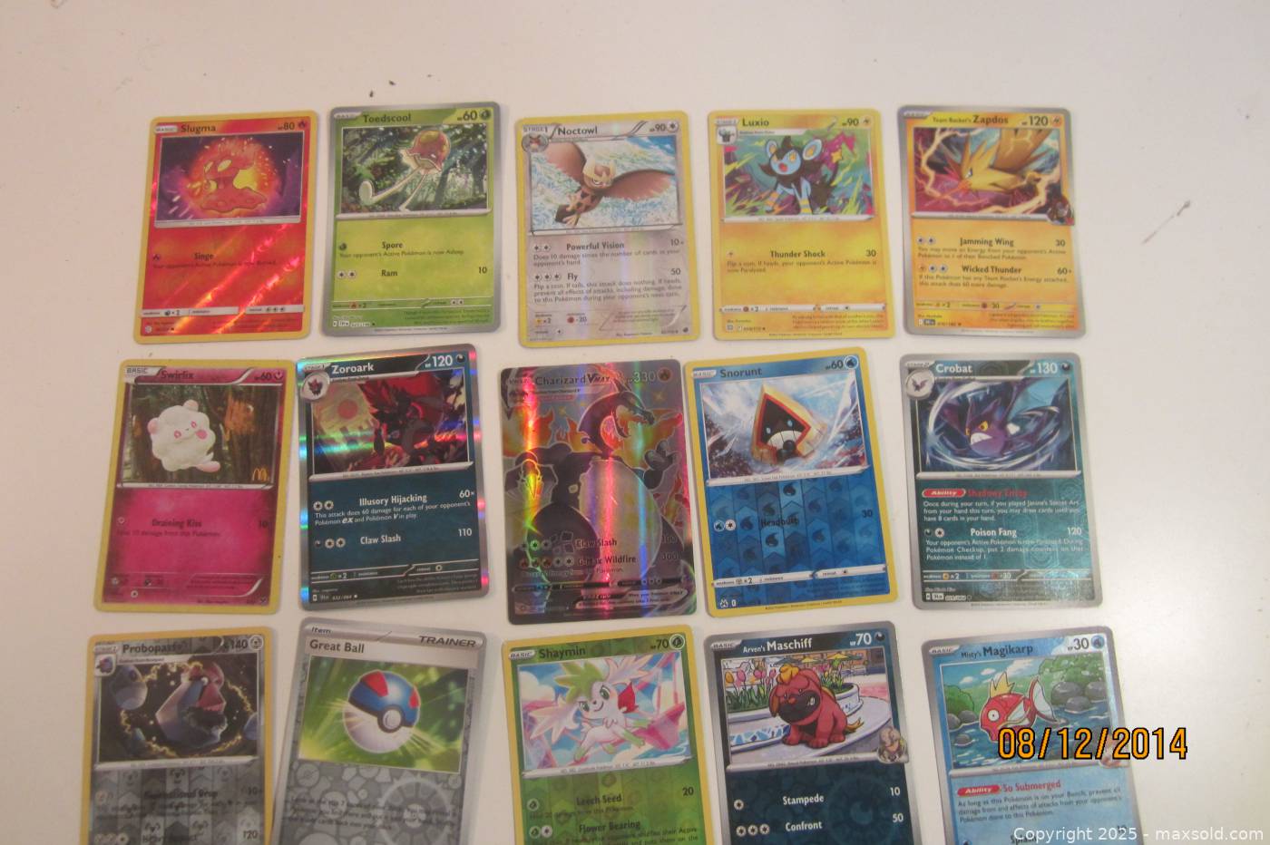 15 holographic and regular Pokémon TCG cards | Maxsold